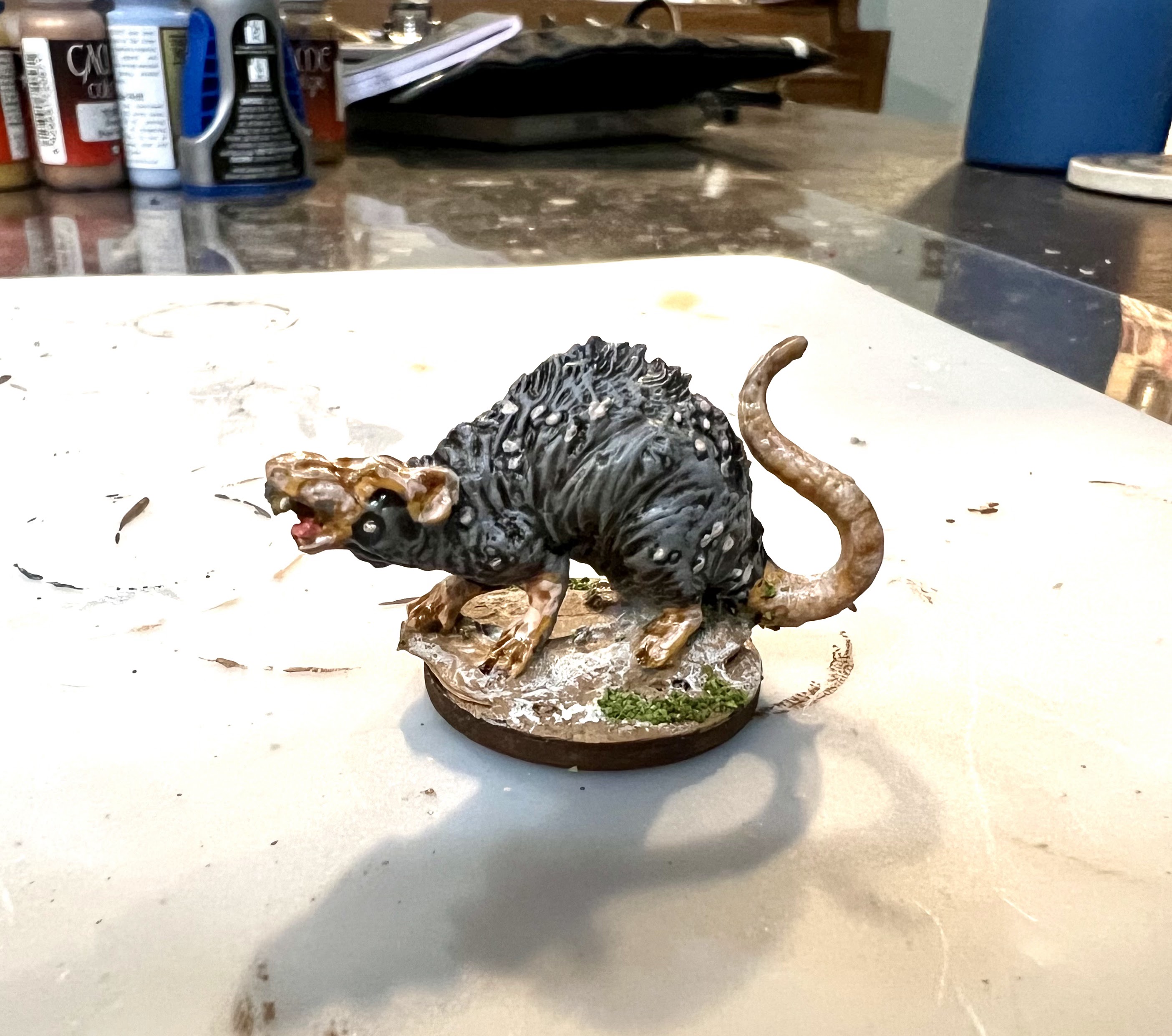 A lizardman, elf wizard, and a giant rat – Strange Vistas